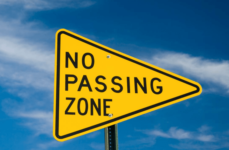 What Does a Pennant-Shaped Road Sign Mean? - TicketSchool